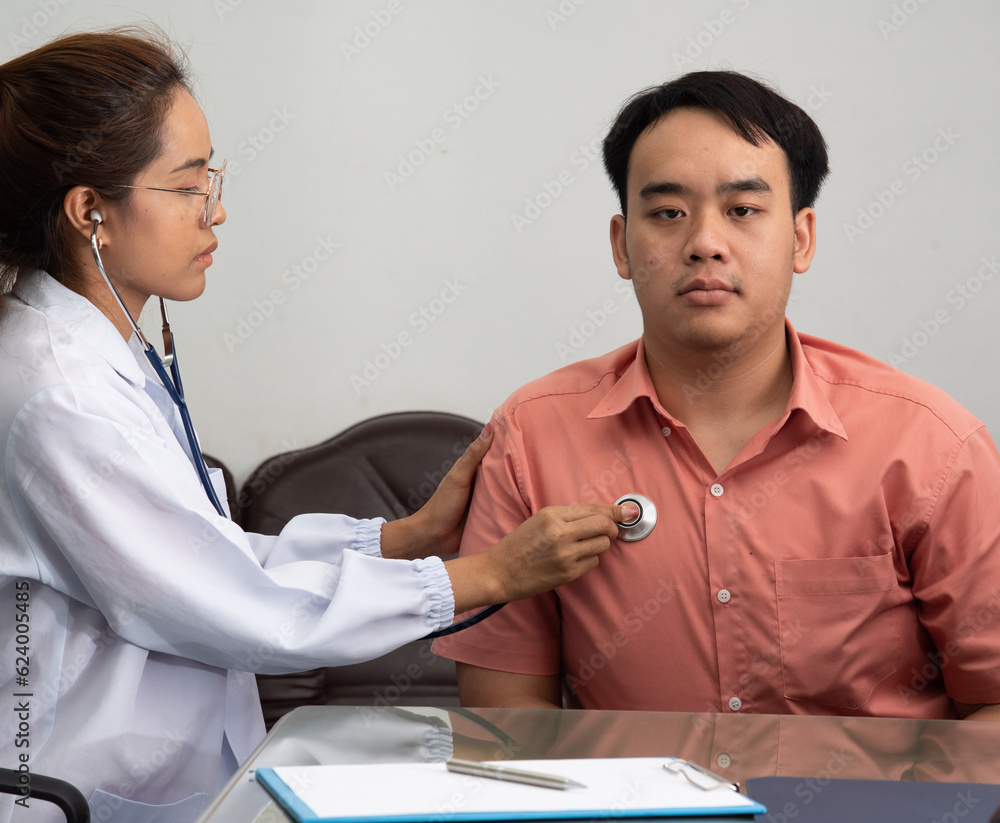 Medicine doctor do physical exam patient with stethoscope in ...