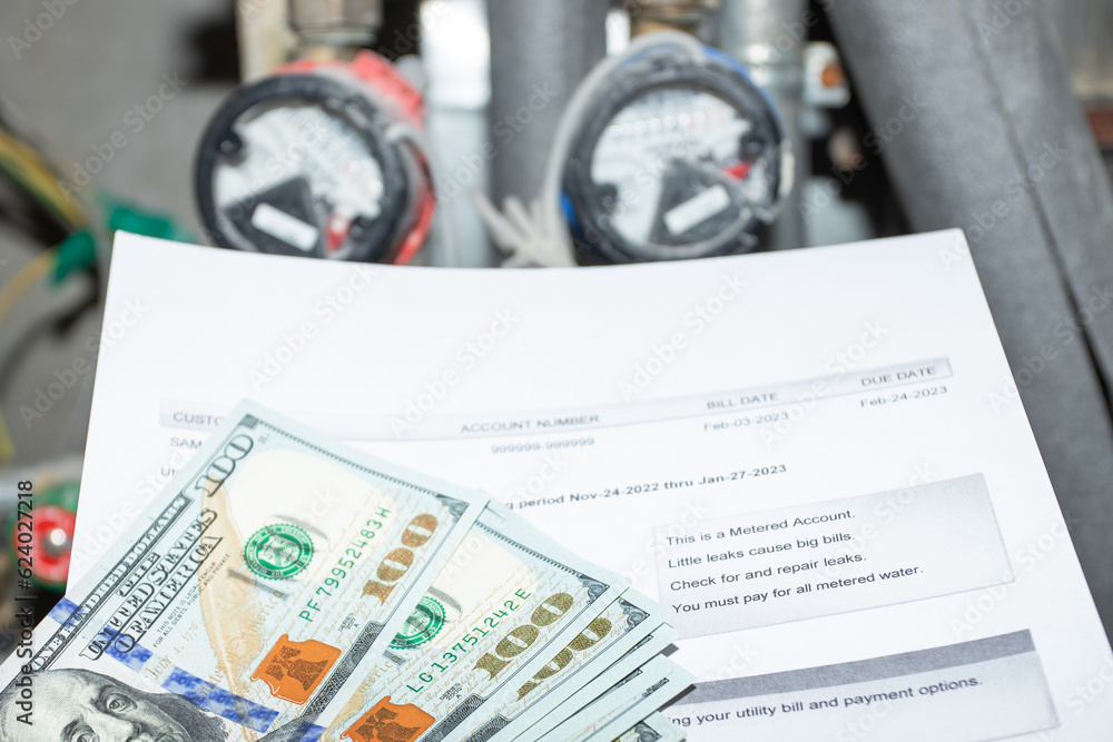 utility receipt and water meters and money dollars cash, Paper bill ...
