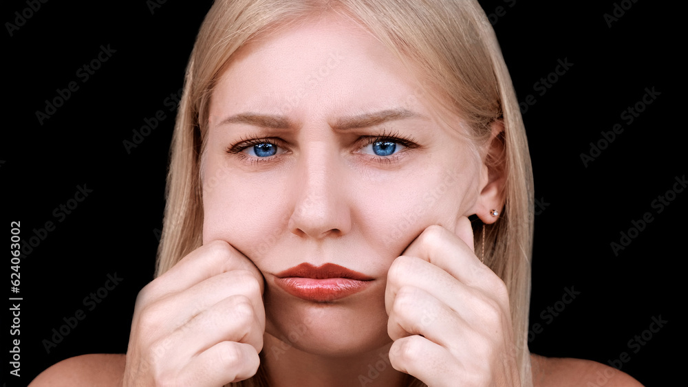 Second chin, obesity. Portrait of a 30-year-old woman pulling back the ...