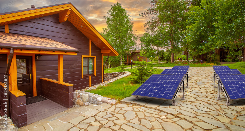 ECO hotel. Solar panels near house. Cottage with photovoltaic ...