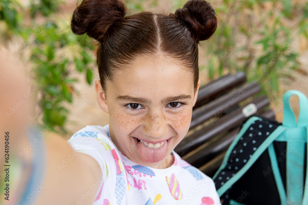 Red haired crazy little girl with freckles laughing and sticking out ...