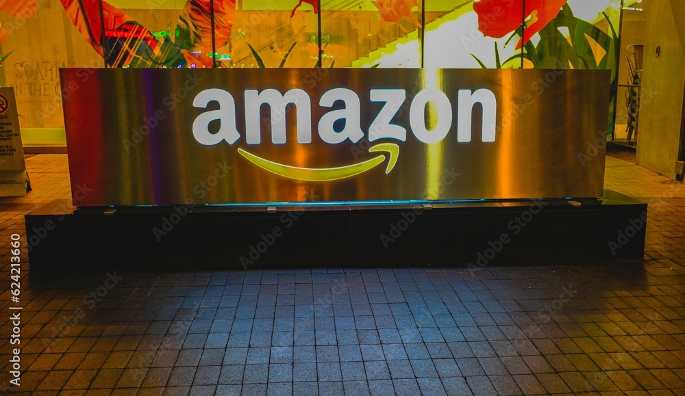 Amazon logo at the distribution center in the night. Amazon logo on the ...
