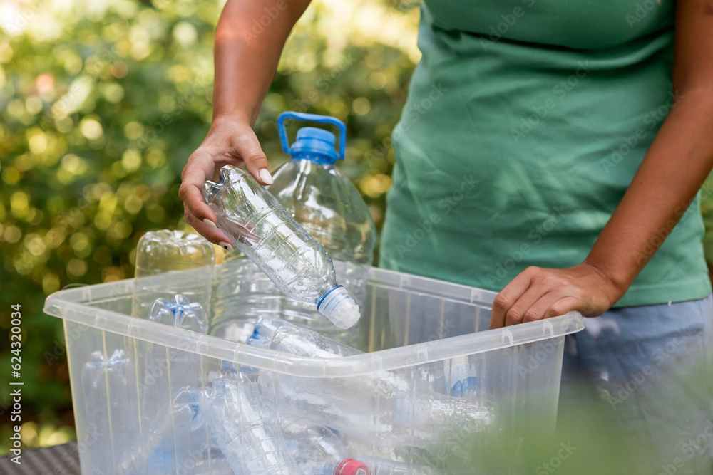 Container of plastic bottles. Garbage collection around the world ...
