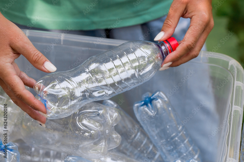 Container of plastic bottles. Garbage collection around the world ...