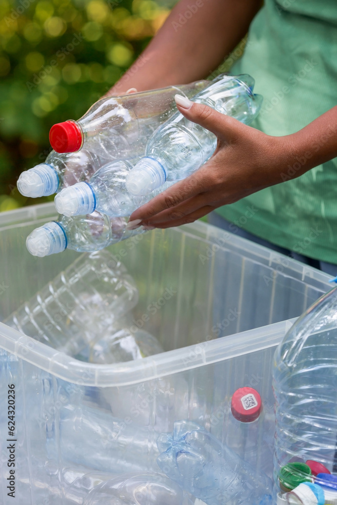 Container of plastic bottles. Garbage collection around the world ...