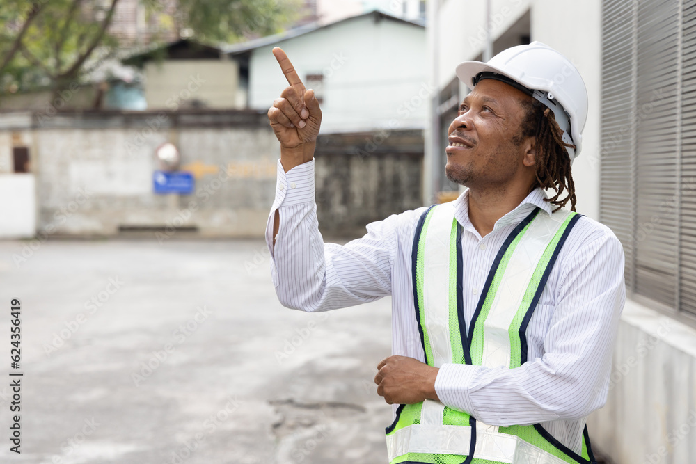 African Engineer man Pointing up Gesture, Guiding Success in ...