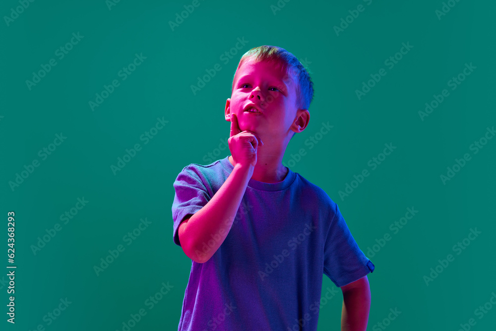 Portrait of little smart boy, child standing with thoughtful face ...