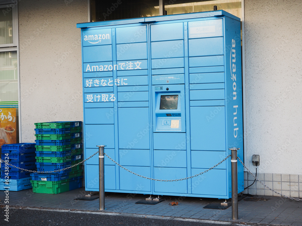 TOKYO, JAPAN - July 11, 2023: Amazon Hub lockers outside a Familymart ...