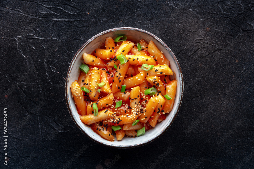 Tteokbokki or topokki, Korean street food, spicy rice cakes in red ...