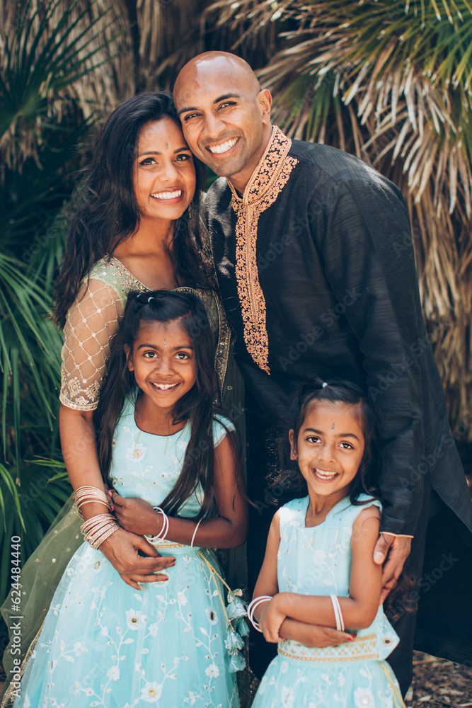 beautiful indian family with daughters girls smiling with a bindi and ...