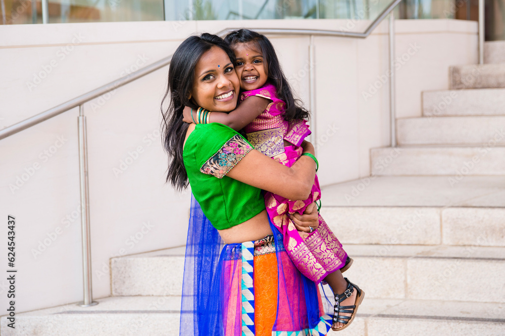 beautiful indian family mom mother with daughter girl hugging and ...