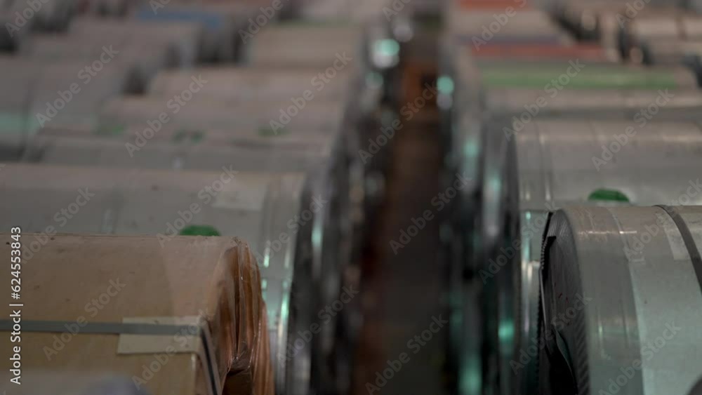 Warehouse of materials of steel role metal sheet. Stacking of steel ...
