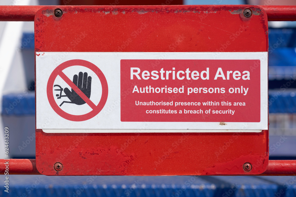 Warning Sign on a gate. Red and white restricted area sign, authorized ...