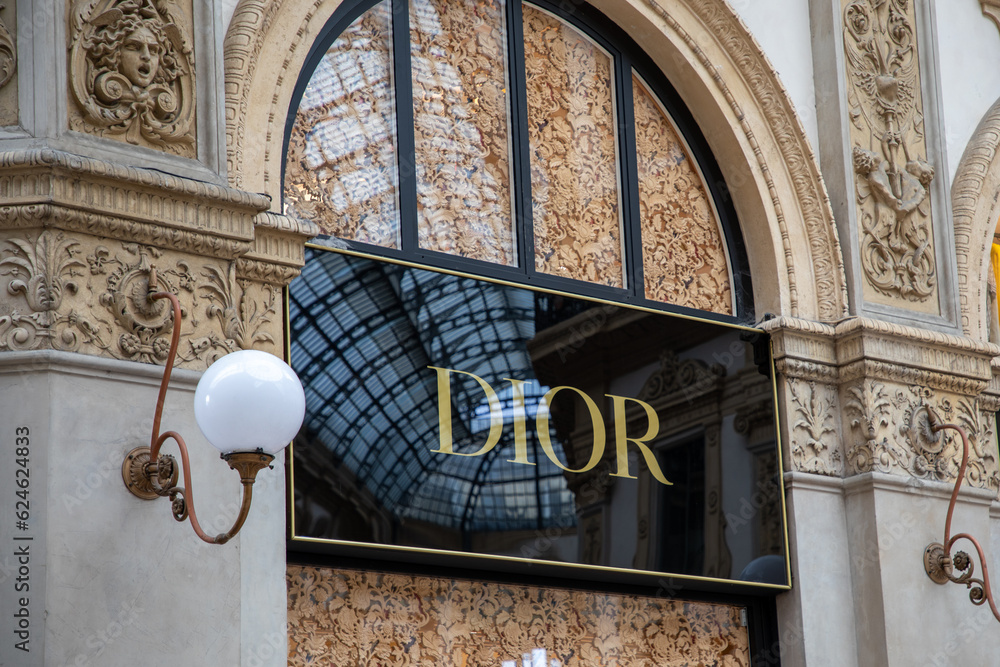 dior store sign text and logo brand of designer fashion chain store ...
