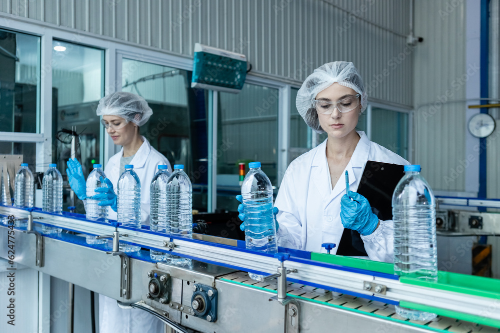 Team factory worker sterile uniform manufacture drink water. Female ...