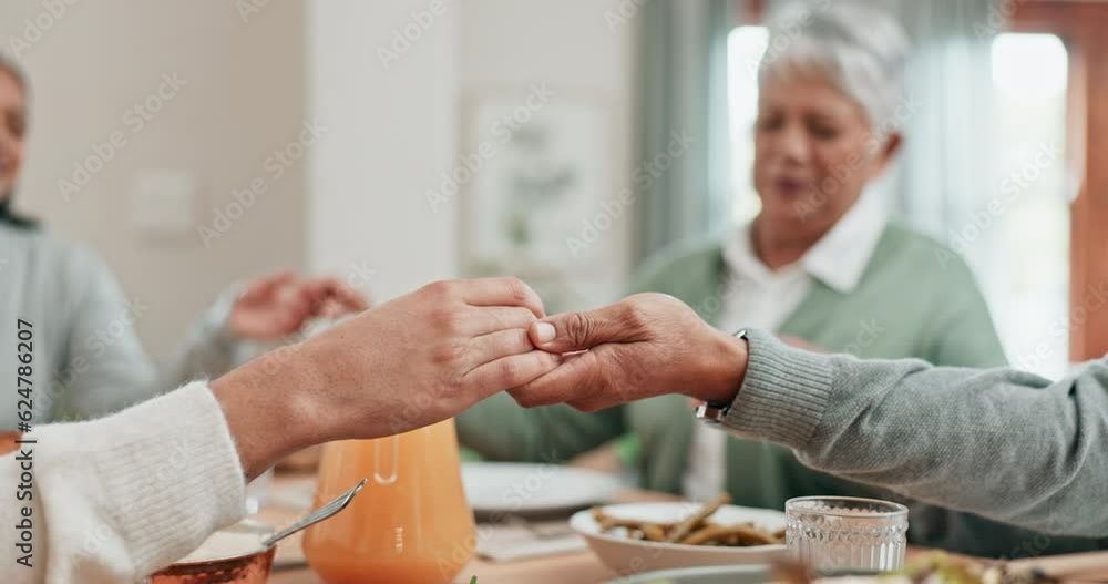 Family, people and holding hands for praying on food at dinner table at ...