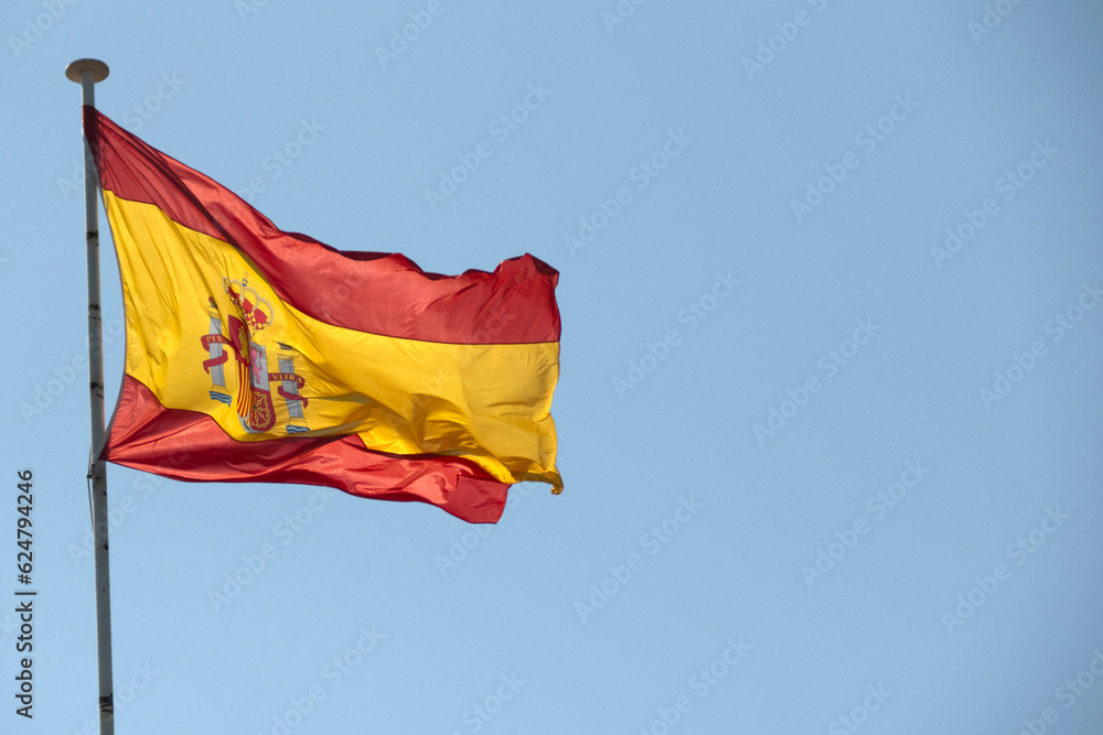 spanish spain flag waving on sky background Stock Photo | Adobe Stock