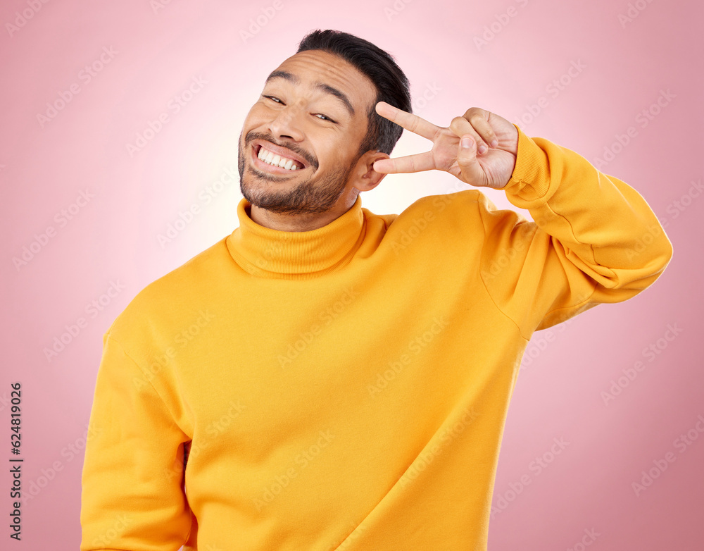 Happy, peace sign and portrait of man in studio for support, kindness ...
