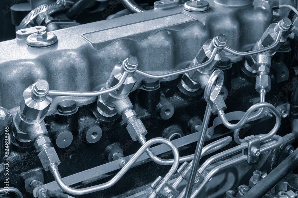 Blue diesel engine. Fragment of a diesel motor close-up. Selective on ...