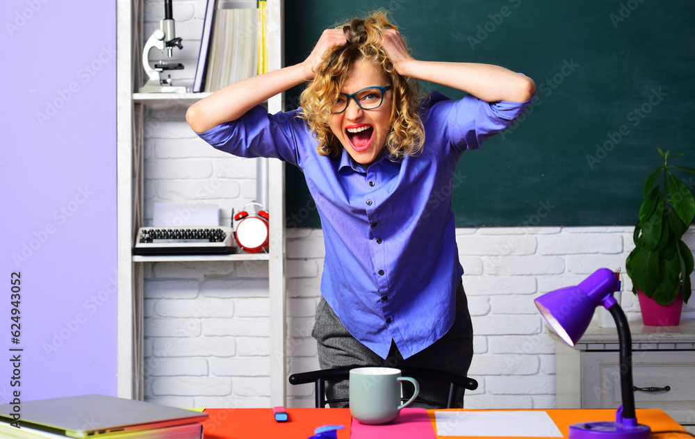 Back to school. Crazy female student in classroom. Exam in college ...