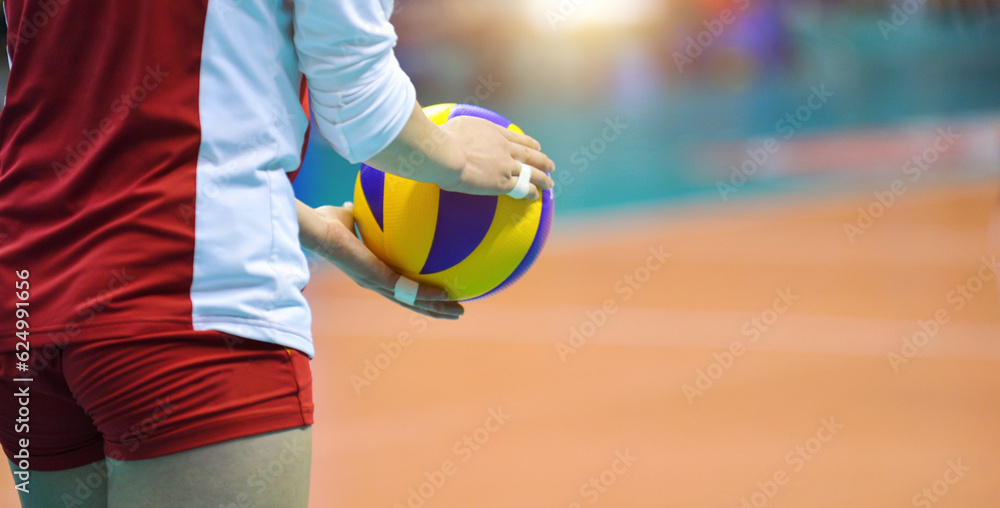 Volleyball ball in the hand of a volleyball player Stock Photo | Adobe ...