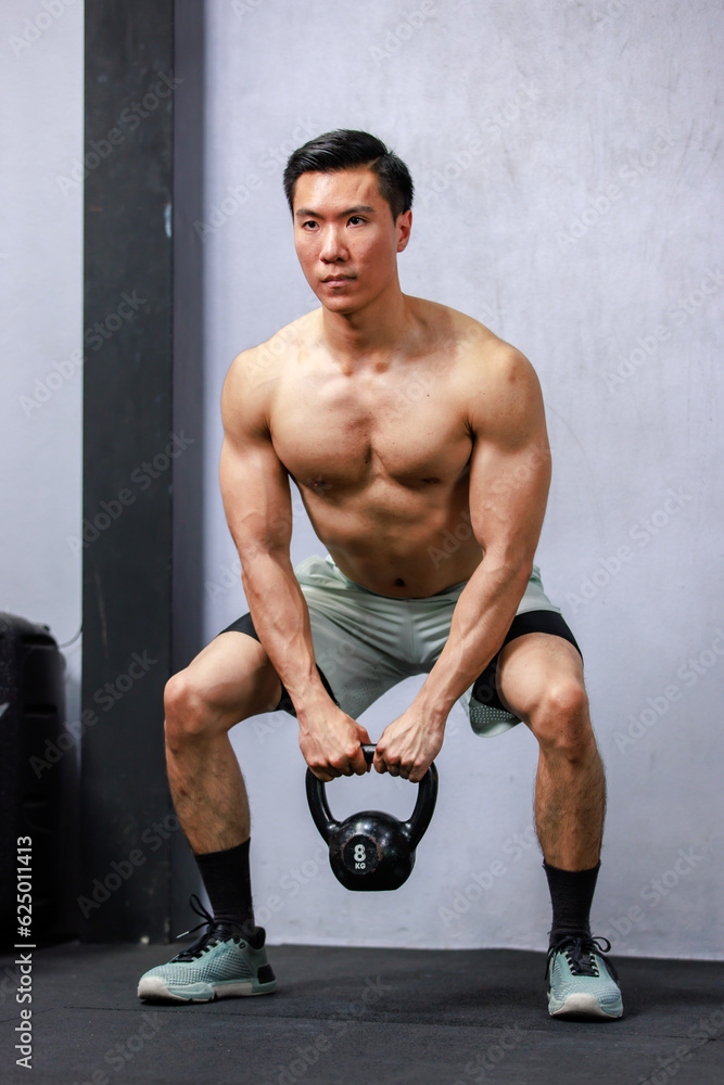 Asian strong handsome young male muscular shirtless fitness model in ...