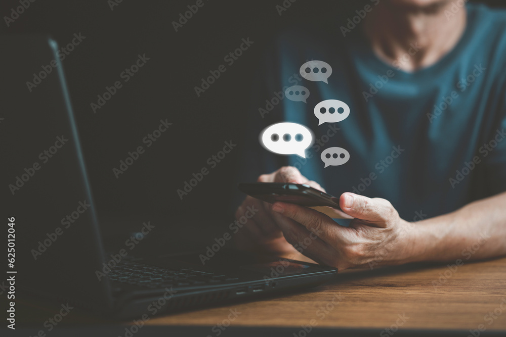 Technology concept, Man hand using smartphone typing live chatting on application communication ...