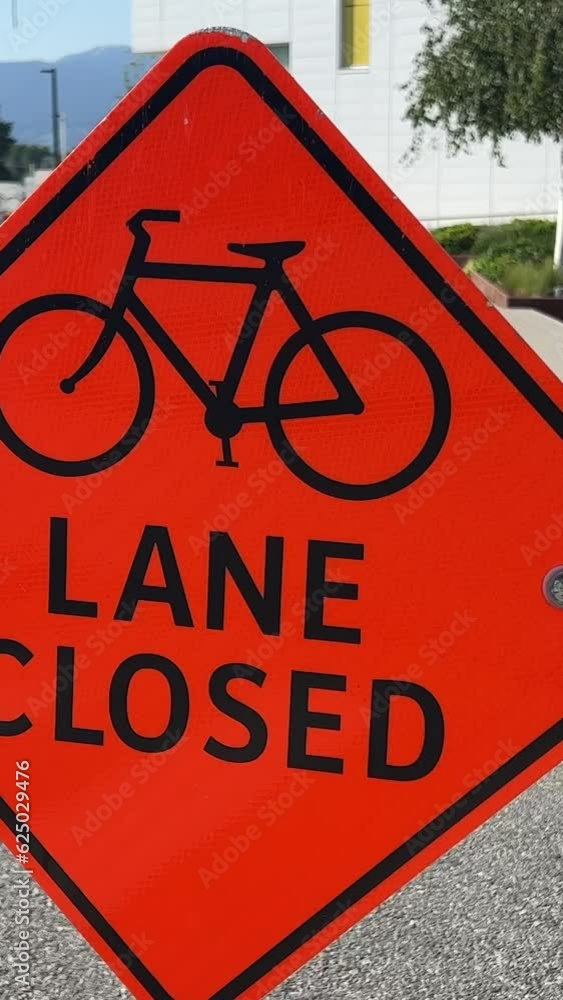 Lane closed sign on the road not allowing bicycles to pass Passage ...