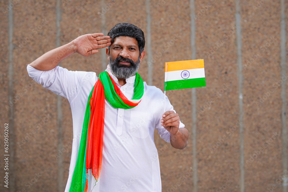Indian man giving salute and celebrate national festival. Stock Photo ...