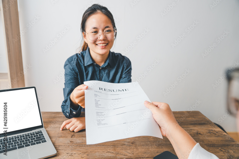 HR managers are interviewing job applicants who fill out their resume ...