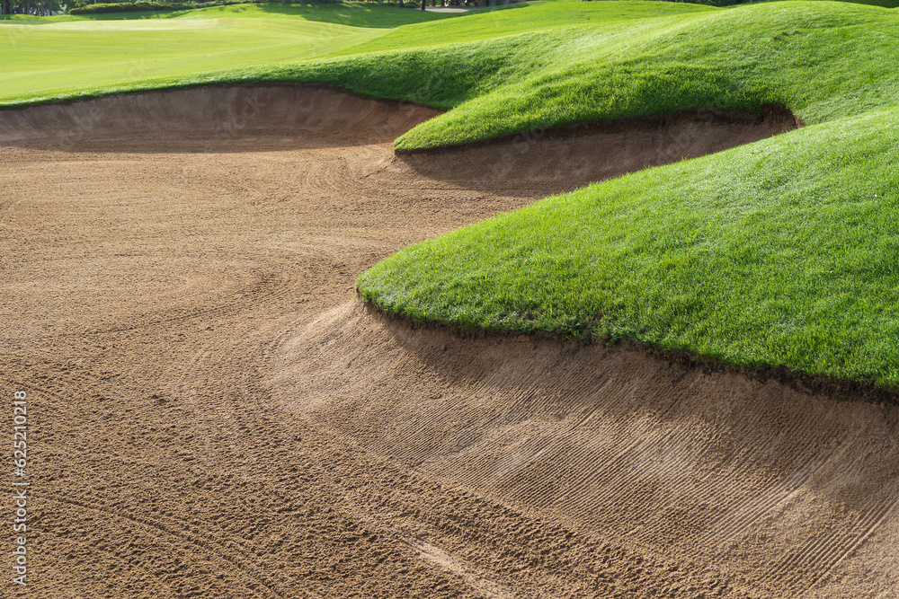 Golf Course Sand Pit Bunkers, green grass surrounding the beautiful ...
