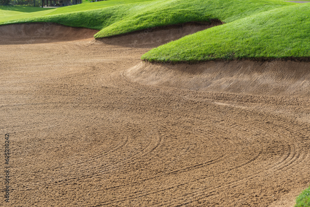 Golf Course Sand Pit Bunkers, green grass surrounding the beautiful ...