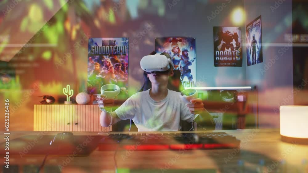 Young gamer in VR headset plays virtual online video game using ...