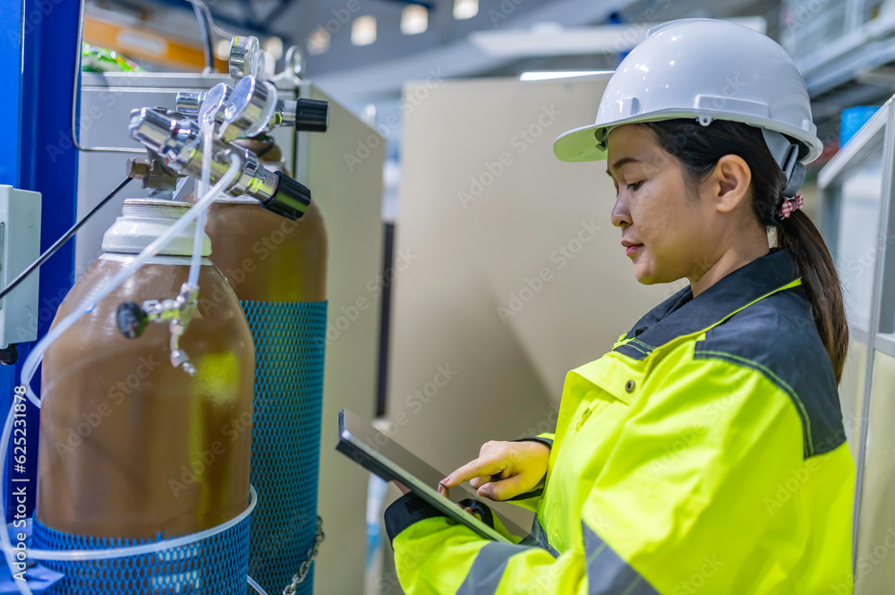 Asian engineer working at Operating hall,Thailand people wear helmet ...