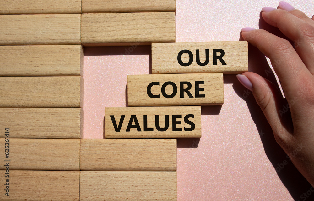 Our core values symbol. Concept words Our core values on wooden blocks ...