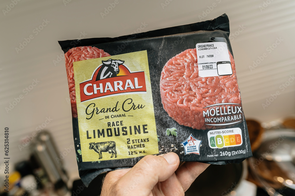 Paris, France - Jun, 3 2023: Hand holding Charal minced steak from ...
