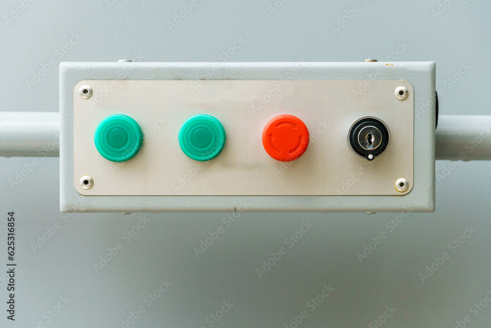 Multi-colored mechanical buttons and a keyhole for turning on the ...