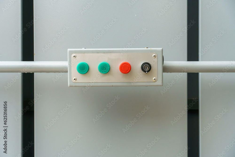 Multi-colored mechanical buttons and a keyhole for turning on the ...