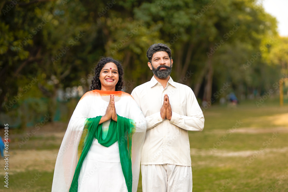 Indian couple in traditional wear and giving namaste gesture. Stock ...