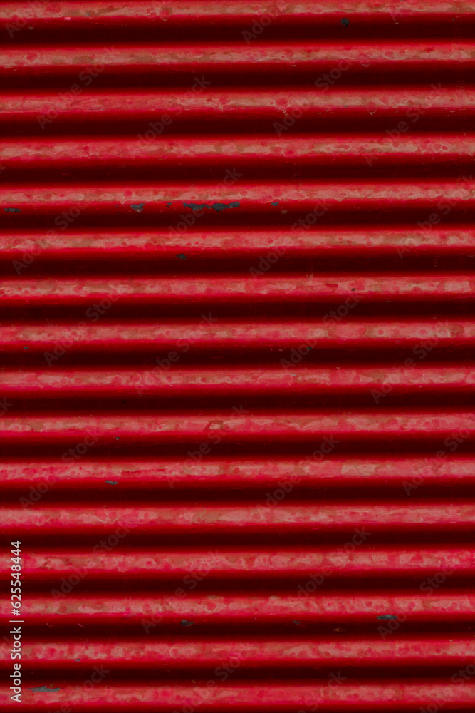Closed red color,aluminum shutter of the building,backgrounds.Vertical ...
