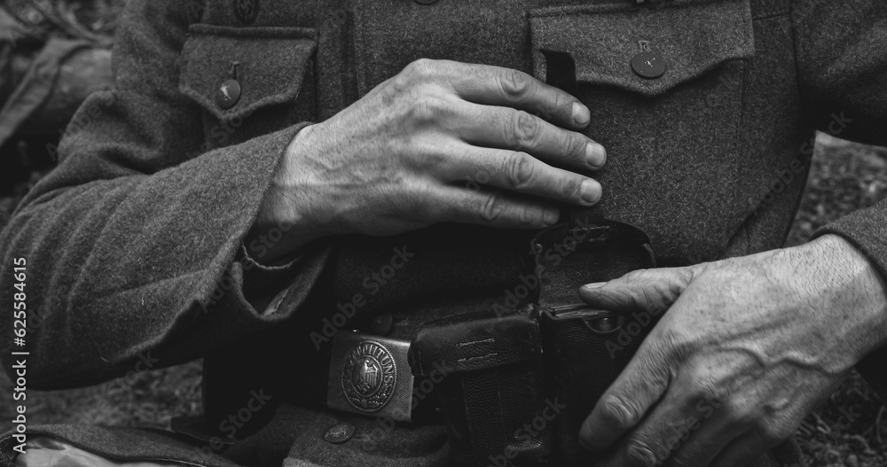 World War II German Soldier Cleaning Rifle. Soldier Preparing Weapon ...