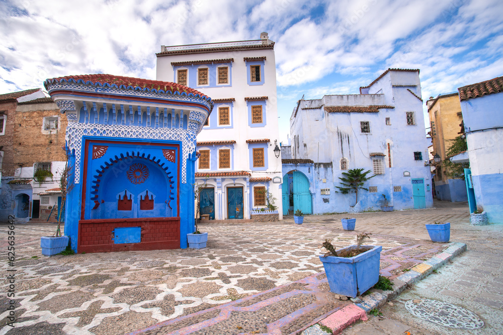 Blue shade of houses, street and alley in Chefchaouen, a city in ...