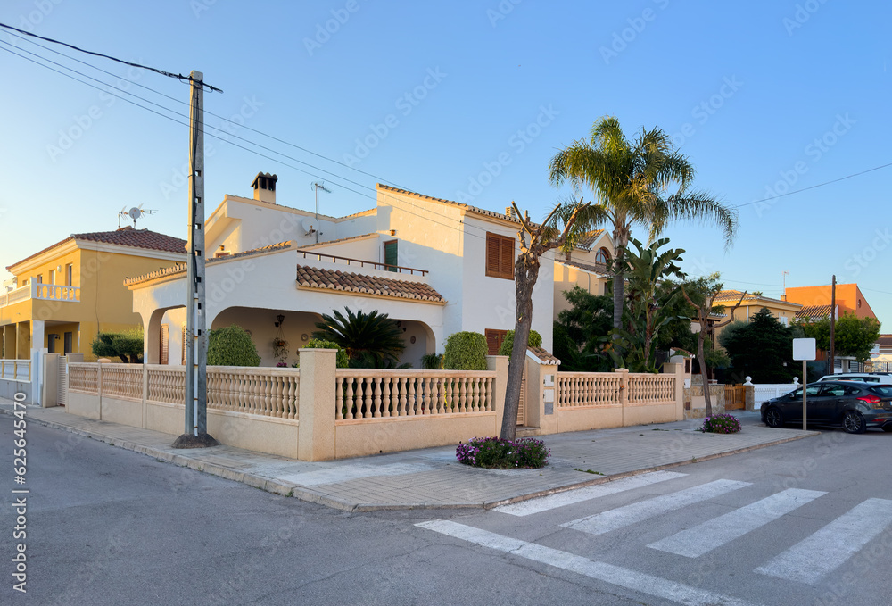 Fence house at street with pavement road. Suburb house building ...