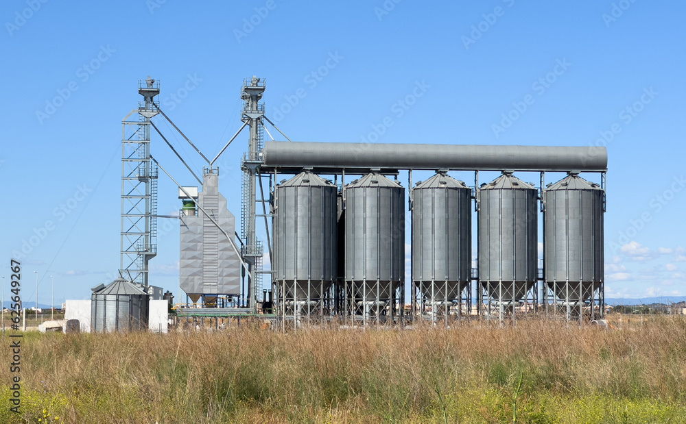 Grain storage. Silo at Agricultural farm. Wheat flour plant production ...