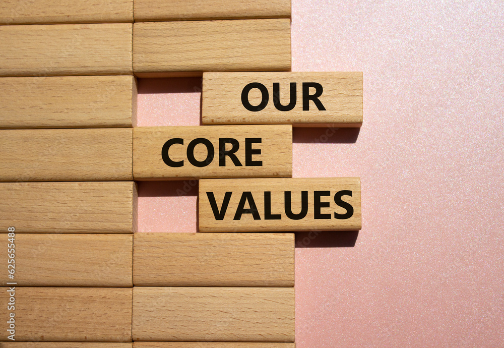 Our core values symbol. Concept words Our core values on wooden blocks ...