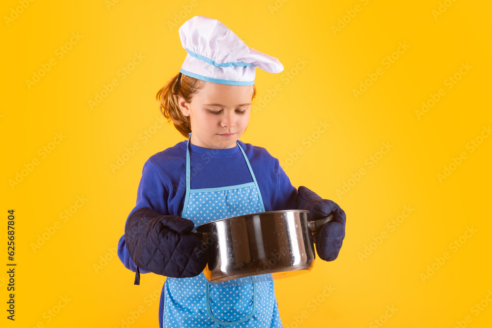 Kid cook with cooking pot. Chef child preparing healthy food. Studio ...
