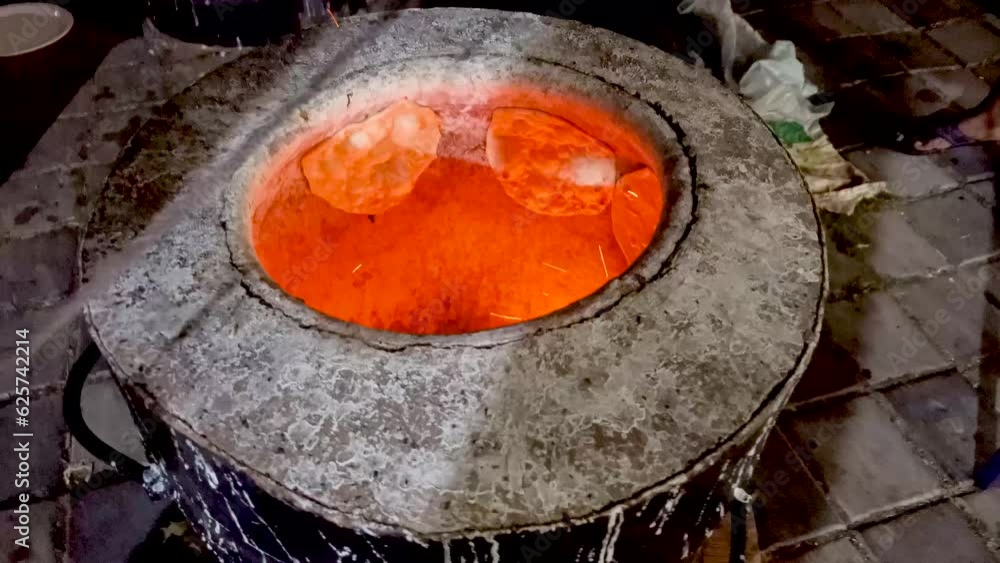 A Punjab style Tandoor stove which uses Wood and Charcoal fire as fuel ...