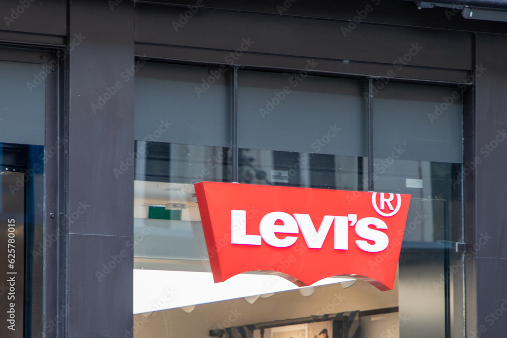 Levis clothing store brand text and shop logo sign Levi's entrance wall ...