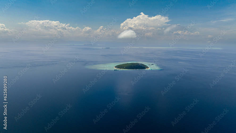 Tropical island Pompong with beach and blue sea. Tun Sakaran Marine ...