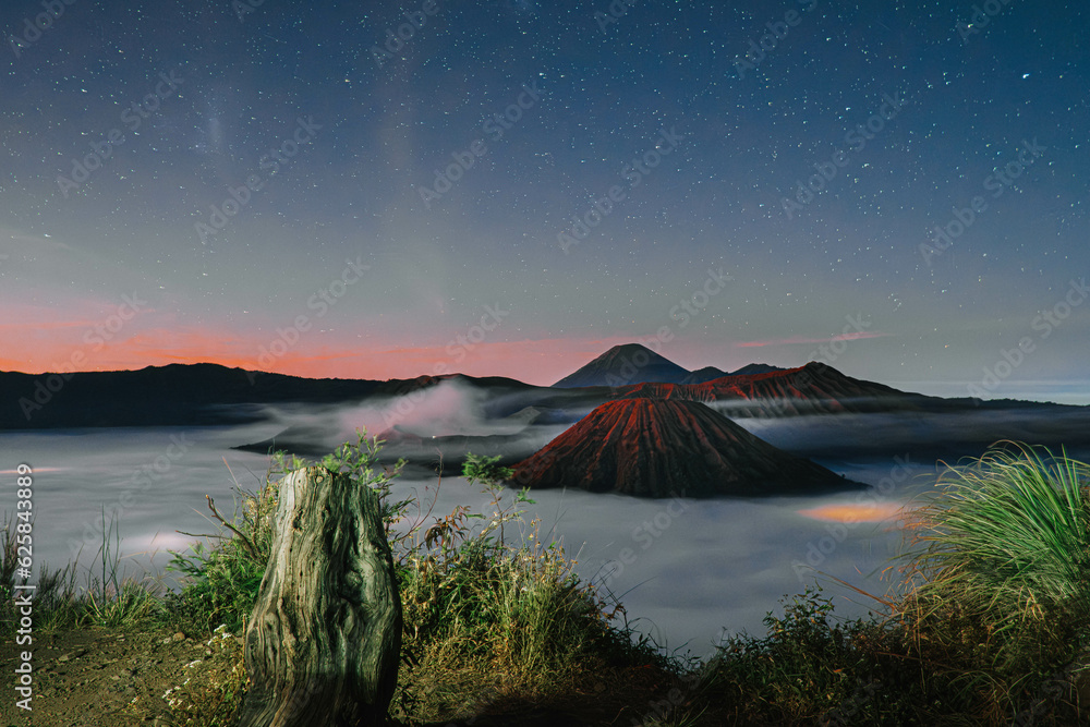 Sunrise at Bromo Mountain is covered by clouds at night with the sky ...